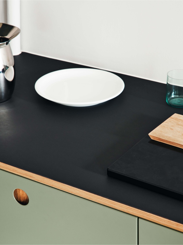 BASIS linoleum kitchen with green cabinet doors | Reform